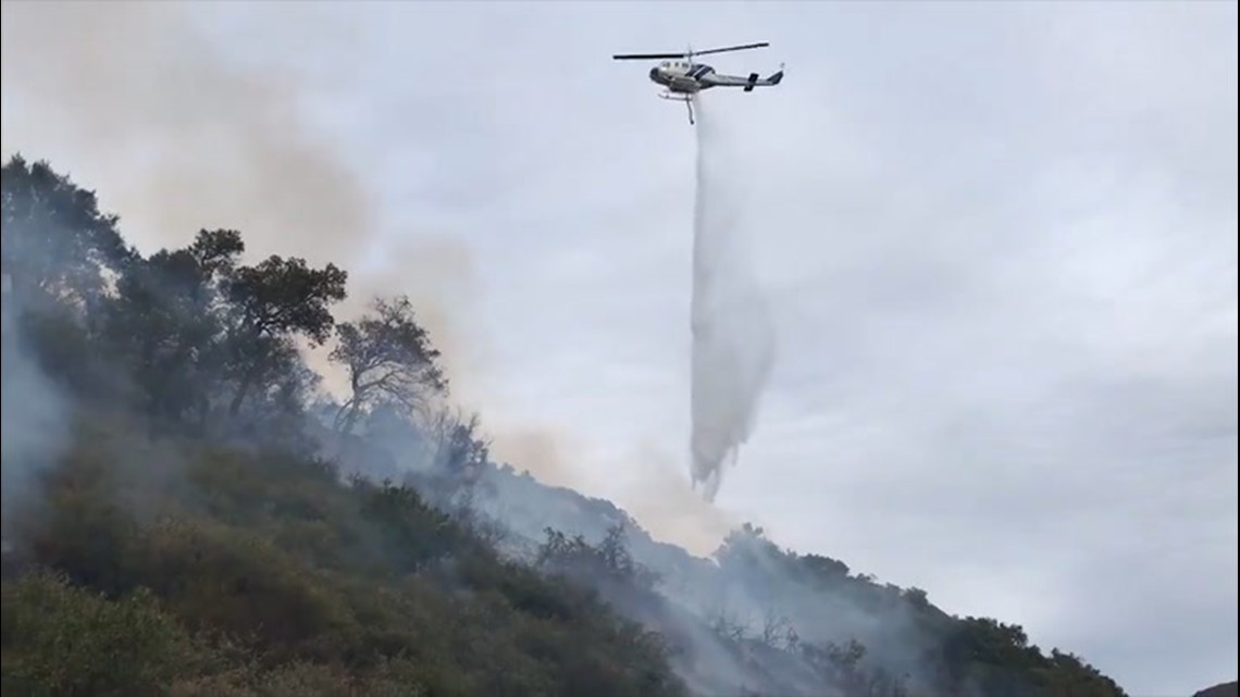 Helicopter drops water on wildfire | wtol.com