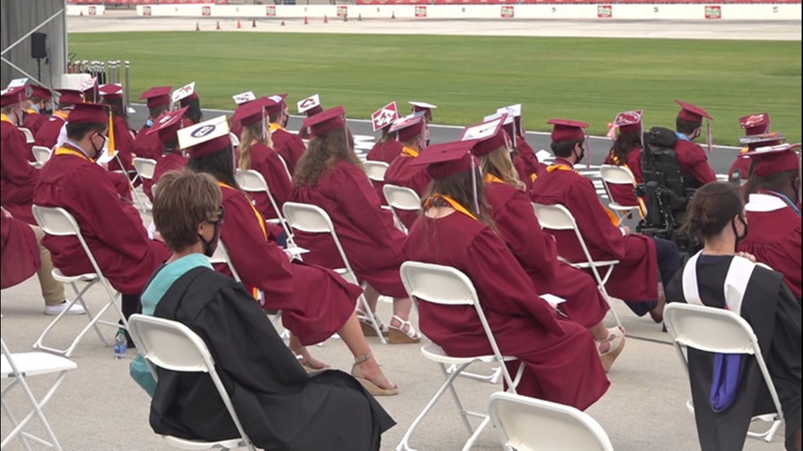 High school seniors cross the finish line at racetrack graduation ...