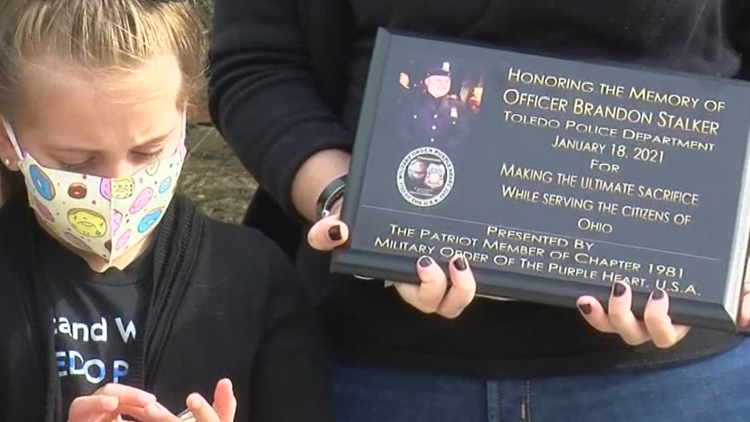 What honors did Toledo officer Brandon Stalker recieve? | wtol.com