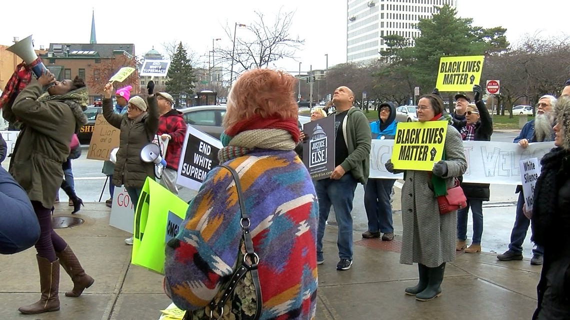 Protesters demand voices be heard during Attorney General's visit to ...