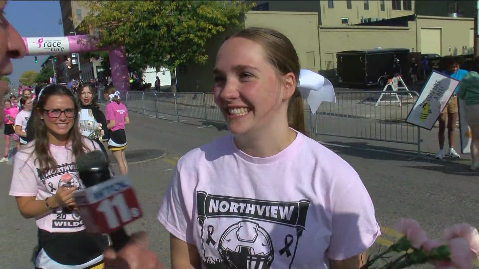 Runners continue to cross finish line, cheerleaders offer extra support ...