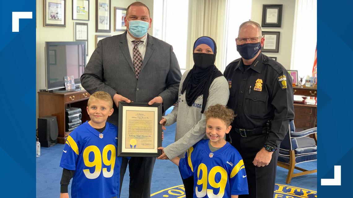 Officer Anthony Dia's family | wtol.com