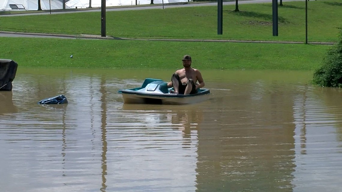 Findlay resident making the best of historic flooding near his home ...