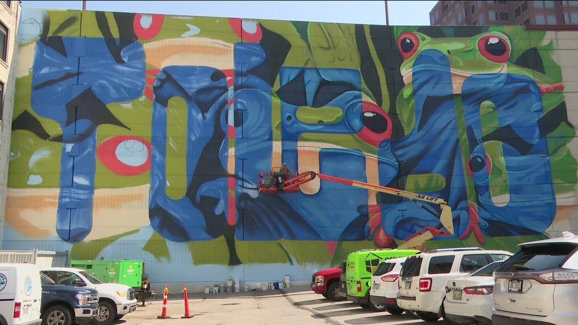 Frog mural in progress as part of River Gallery project | wtol.com