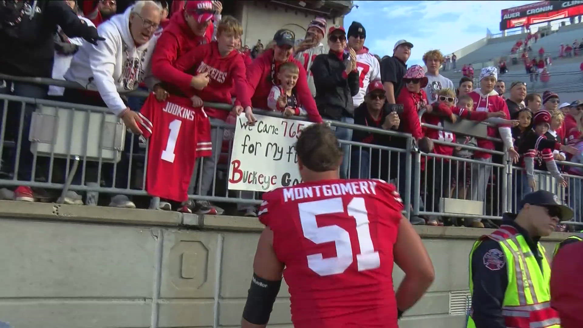 Findlay community hosts watch party as former Trojan suits up for Ohio ...