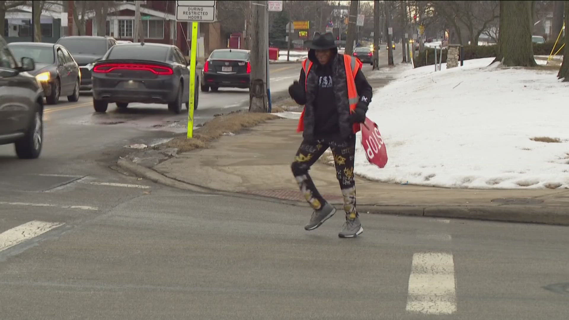 Toledo's 'Dancing Crossing Guard' helps Old West End start the day off ...