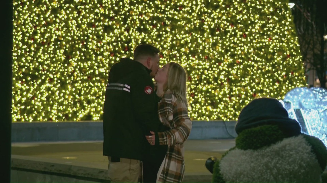 Couple proposes at Promenade Park under Christmas lights | wtol.com