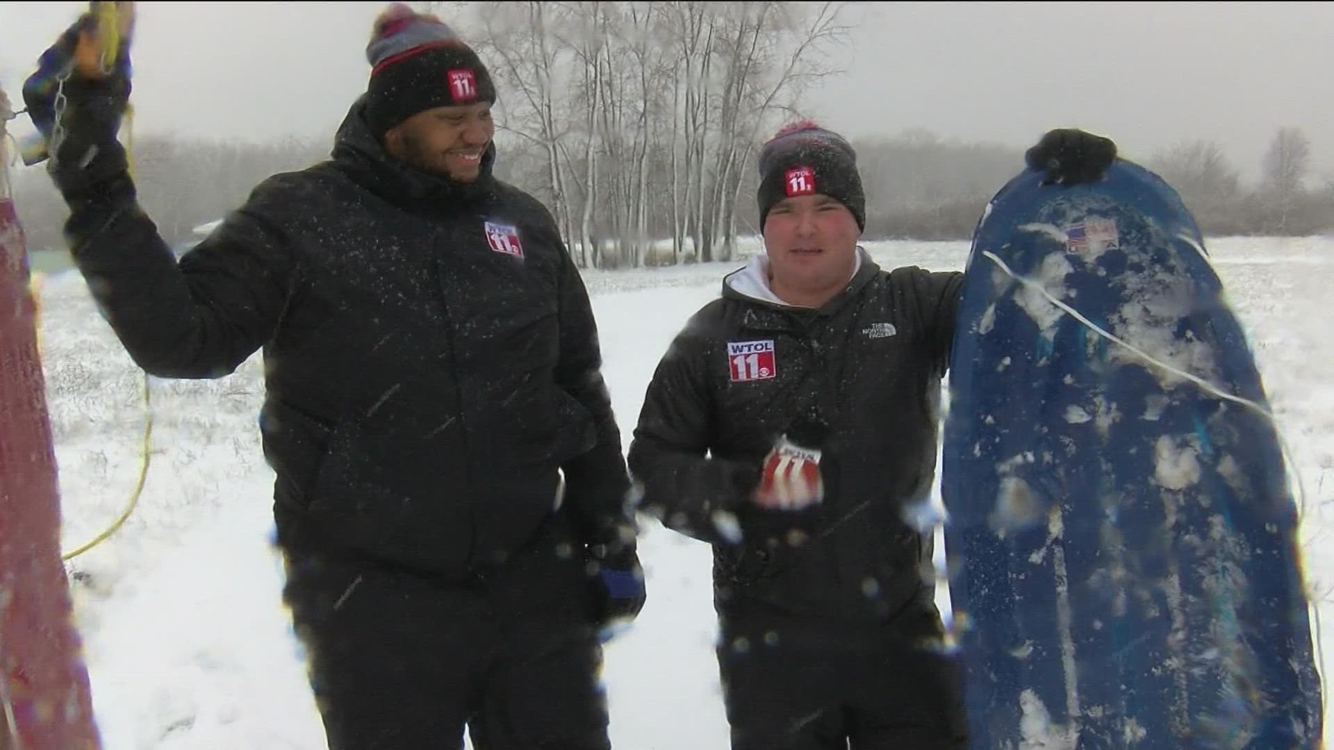WTOL 11's Matt Willoughby, Tyler Seggerman sled race down Maumee Bay ...