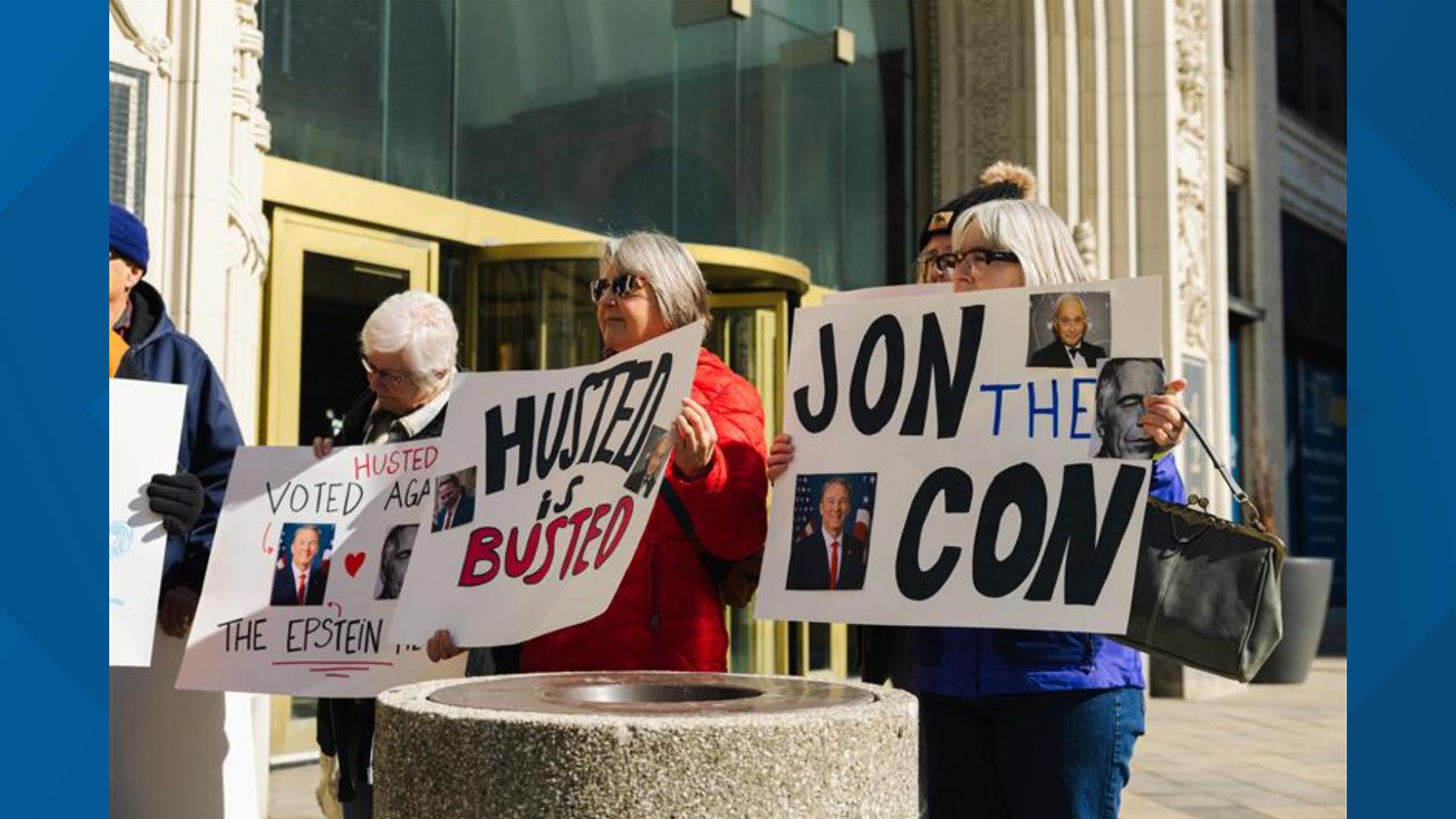Ohioans protest outside Husted’s Toledo office over donations tied to ...