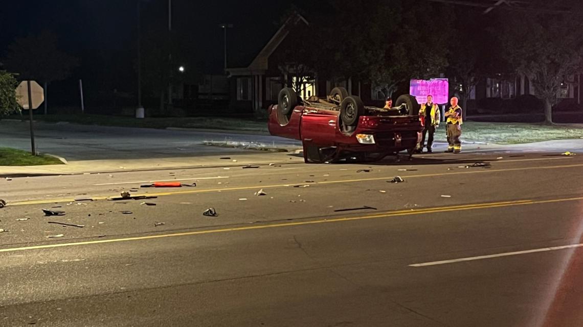 Police: Two detained, two still missing after truck rolls over on ...