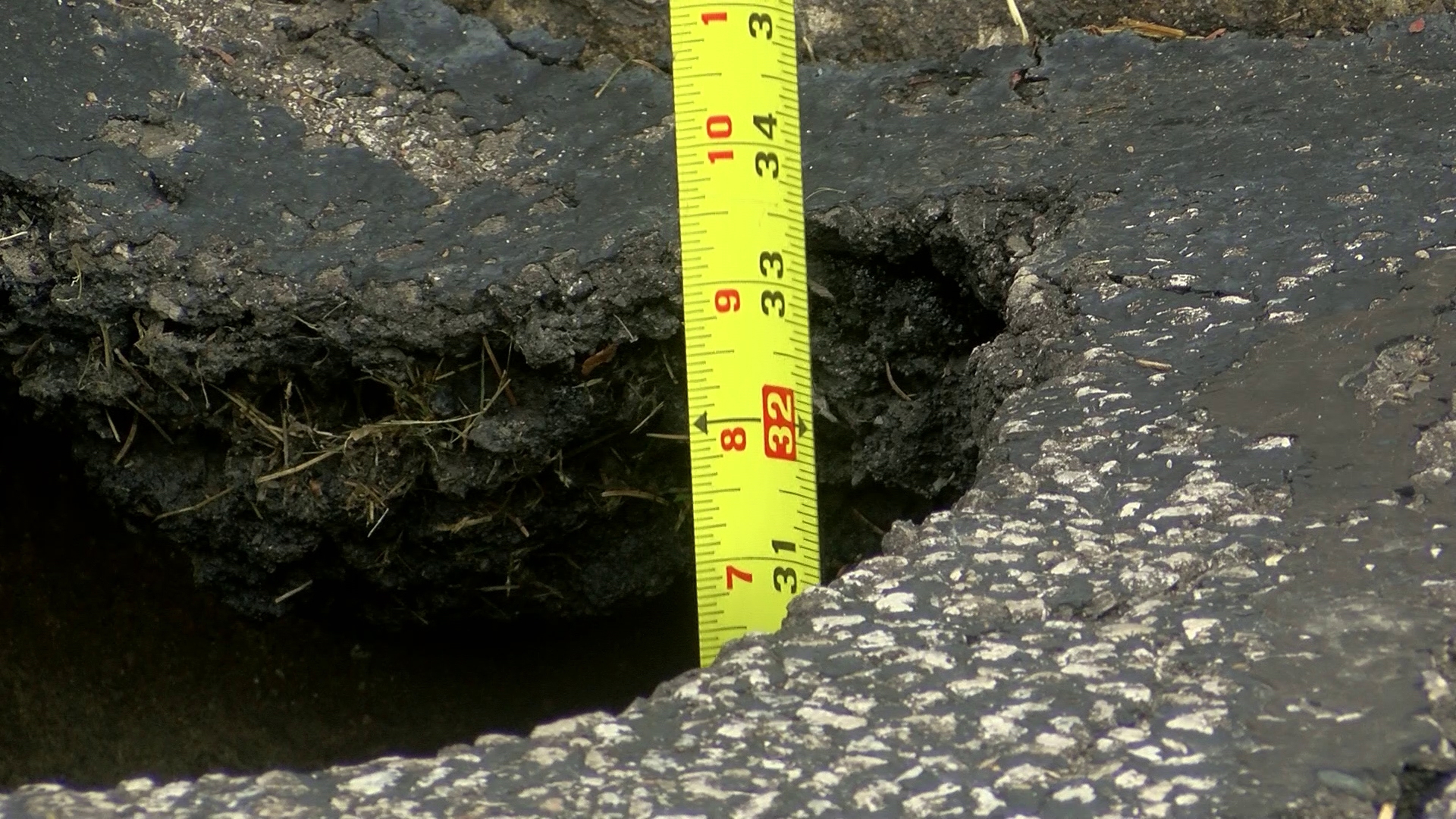 Woman injured after falling into Point Place sinkhole | wtol.com