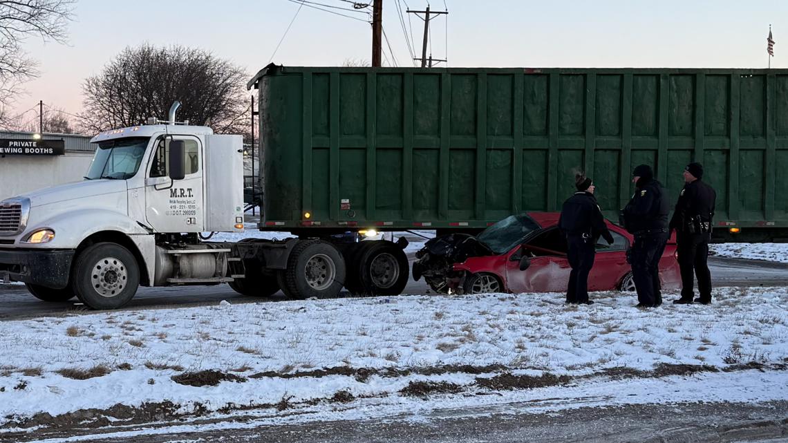One person injured in west Toledo crash involving car under truck ...