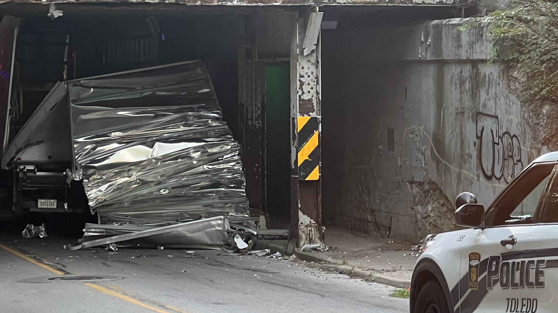 Commercial vehicle crashes into N. Hawley Street bridge Wednesday ...