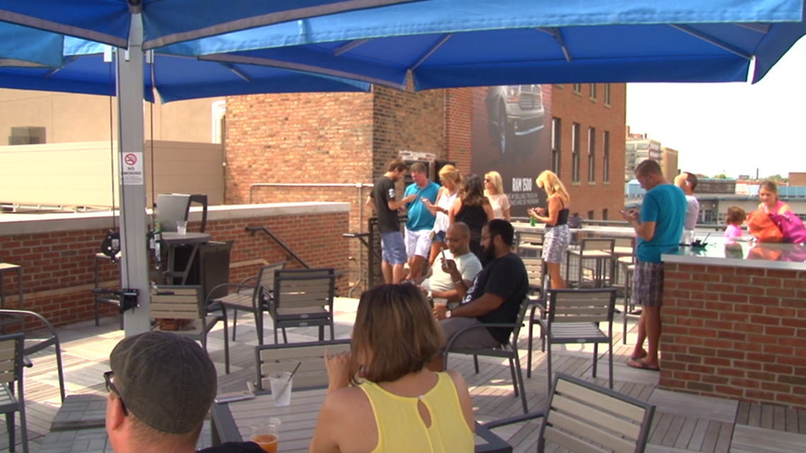Eclipse-Watchers see view from rooftop of "Nine" in downtown Toledo ...